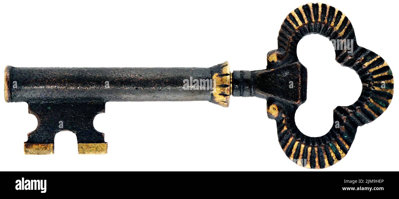 Decorative old-fashioned bronze key isolated on white Stock Photo - Alamy