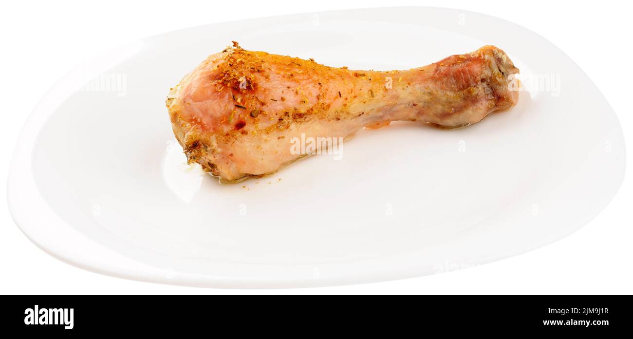 Roasted chicken leg on plate isolated on the white Stock Photo - Alamy