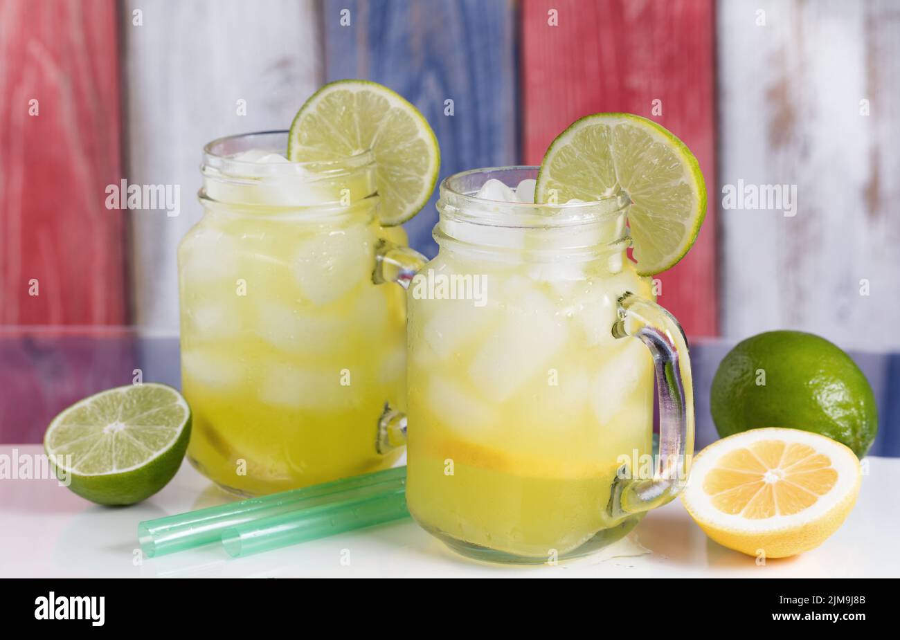 Glass jars filled with cold lemonade on USA national colors for the ...