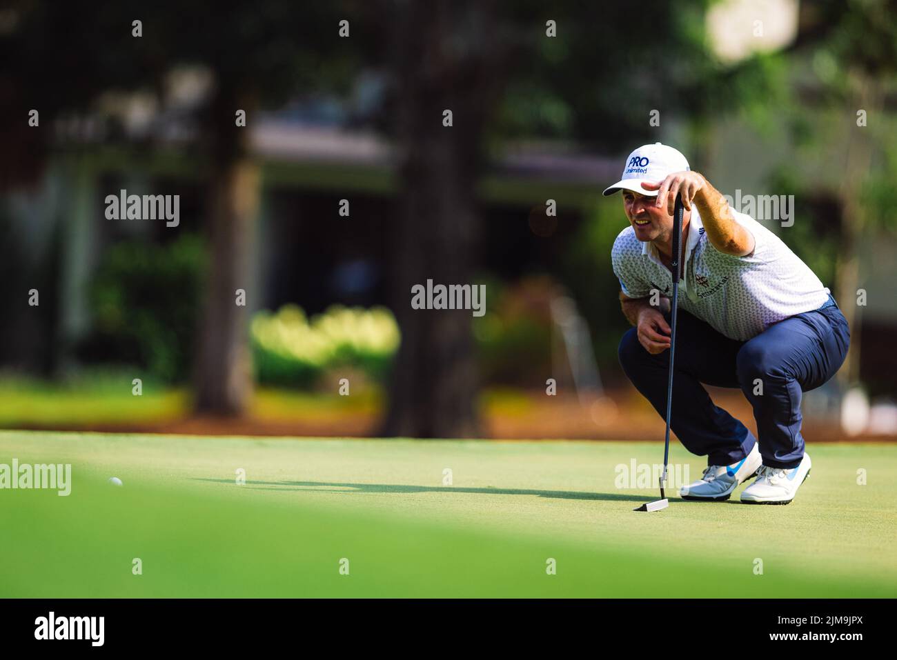 August 4, 2022: Denny McCarthy checks his line on the 9th green during ...