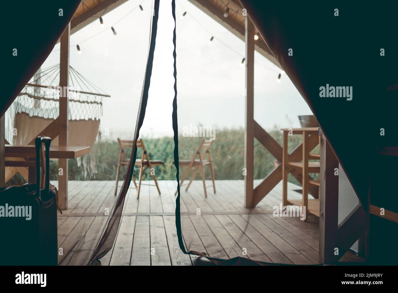 Two chair in terrace. Luxury tent. Nature landscape Stock Photo - Alamy