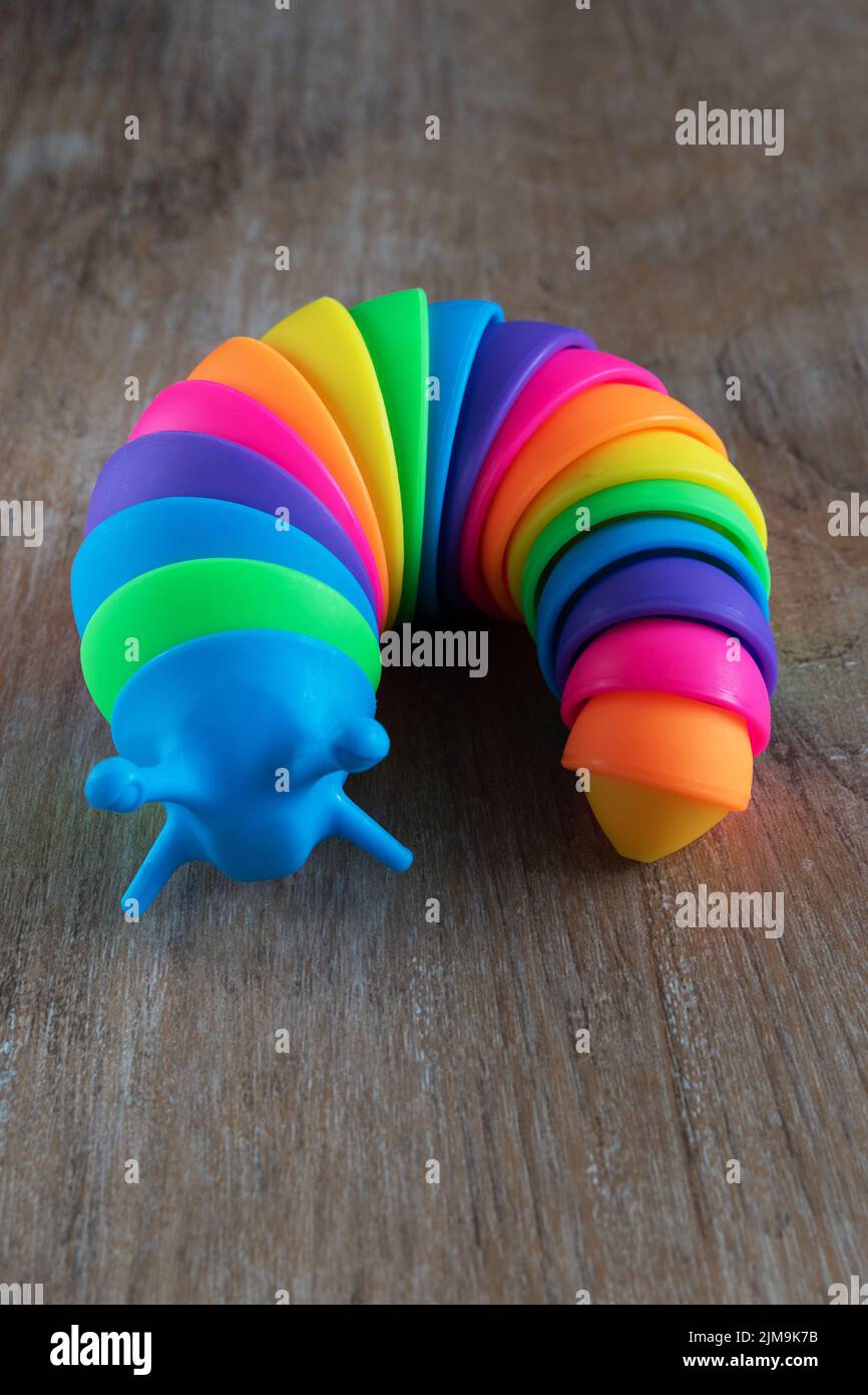3D articulated fidget toy slug shape Stock Photo - Alamy