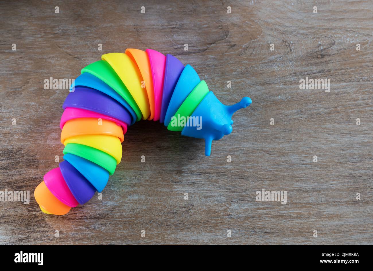 3D articulated fidget toy slug shape Stock Photo - Alamy