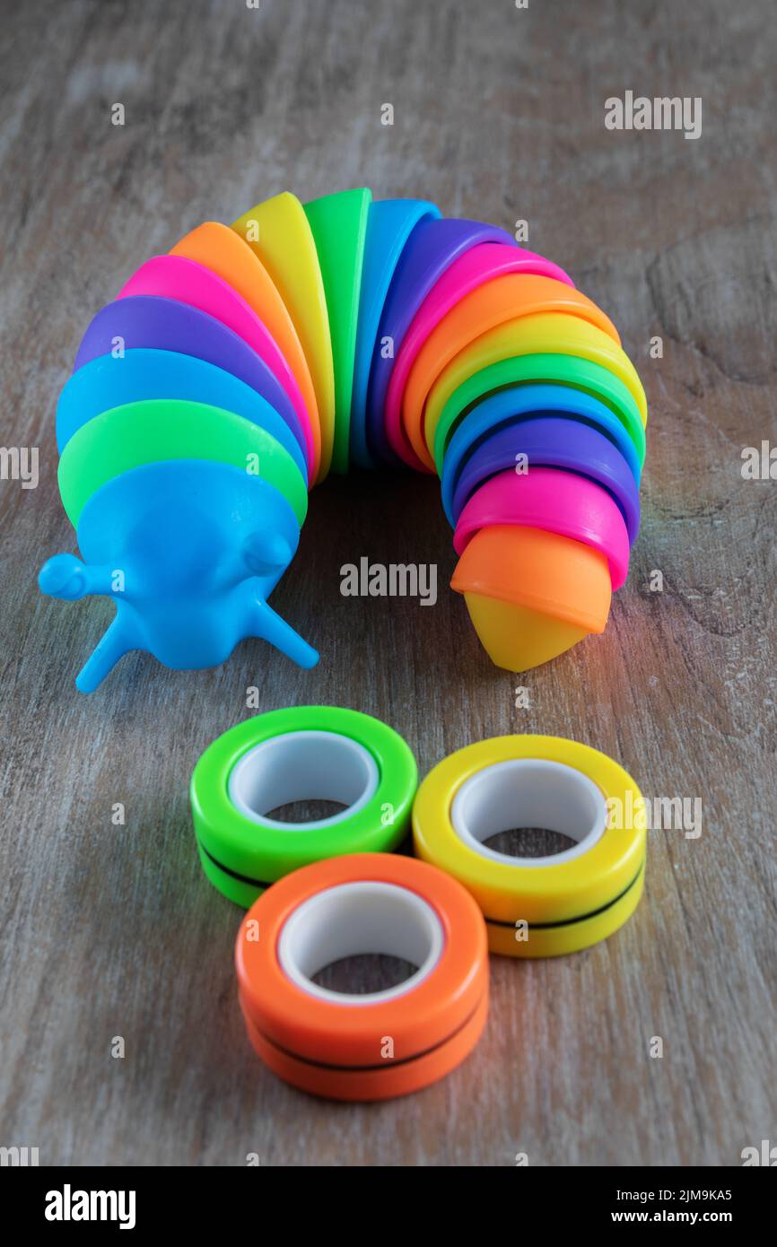 3D articulated fidget toy slug shape Stock Photo - Alamy
