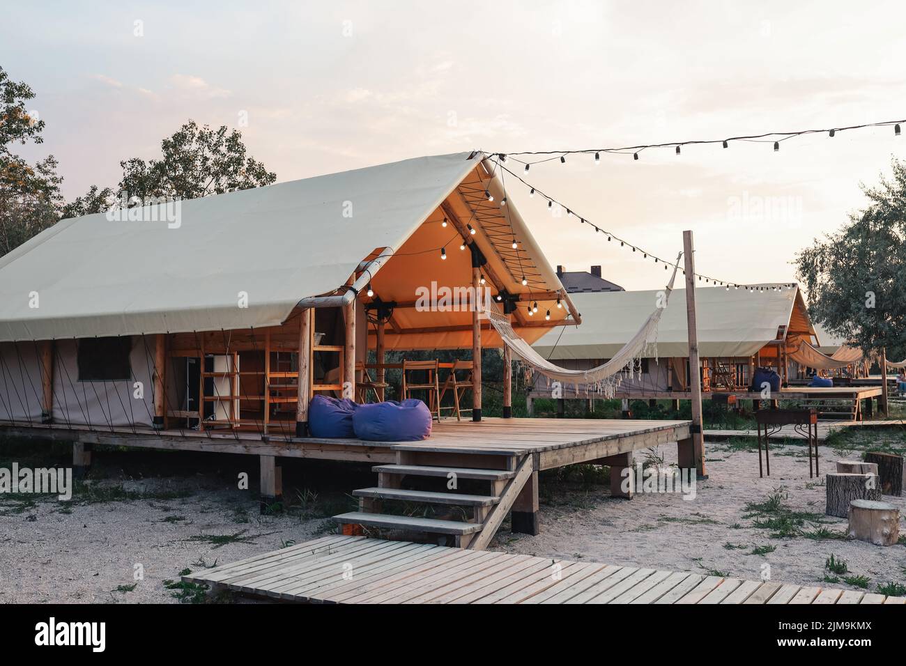 Glamping tent in the forest. Luxury tent sea view. Nature green tourism ...