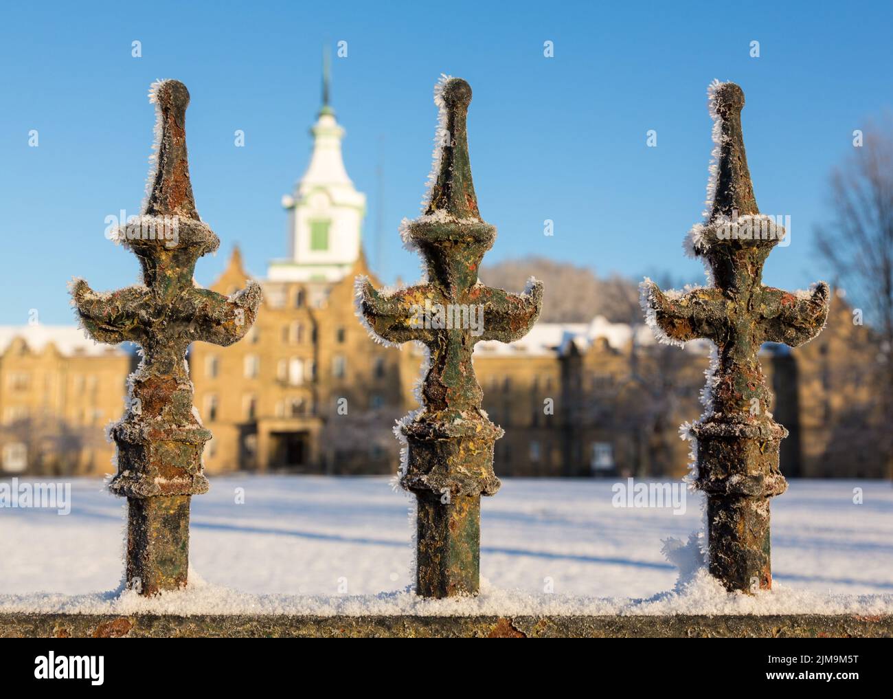 Railings in snow outside Trans-Allegheny Lunatic Asylum Stock Photo - Alamy