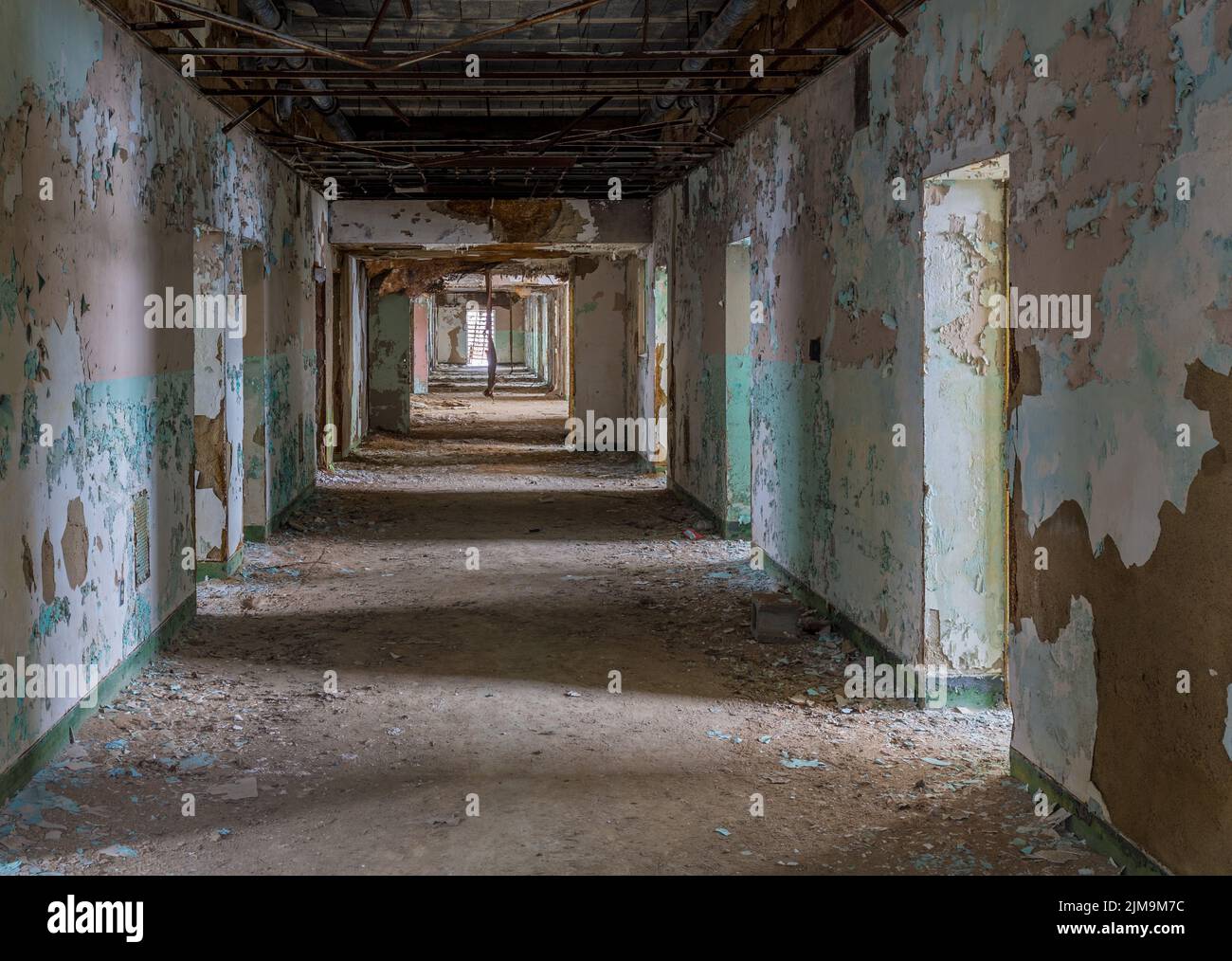Long corridor inside Trans-Allegheny Lunatic Asylum Stock Photo - Alamy