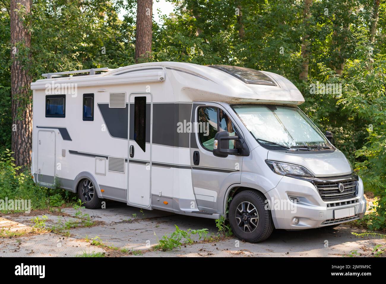 17 july 2020, Russia, Novosibirsk: A white mobile home is parked in the ...