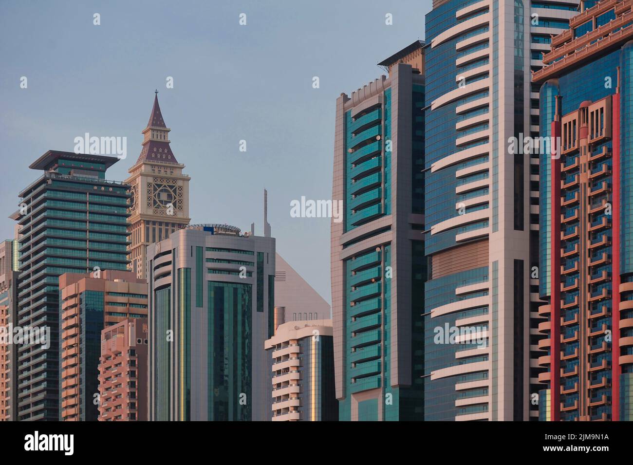 Close-up of tall and modern office and apartment buildings along Sheikh ...