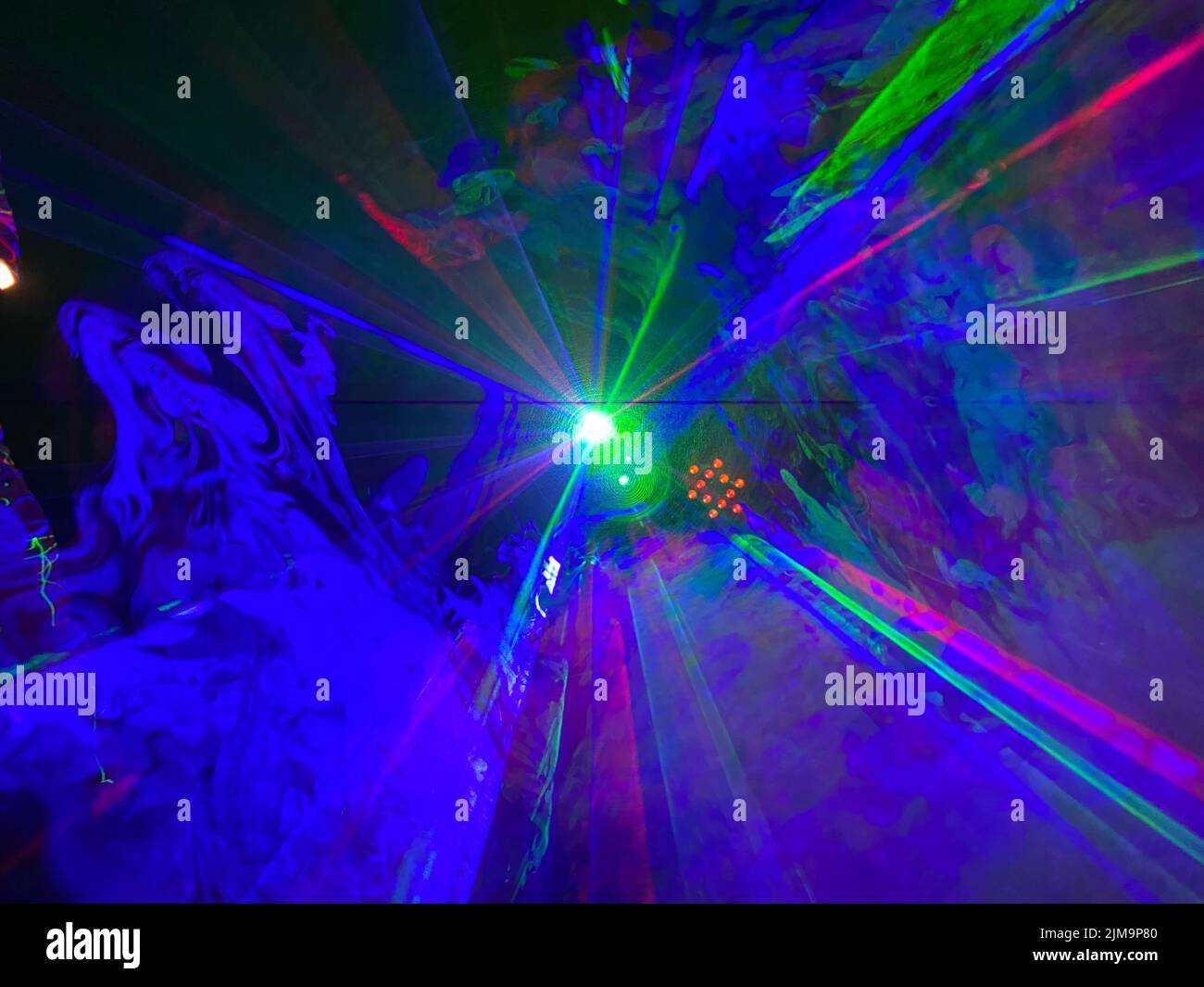 Colorful laser light beam photographic effect on black background ...