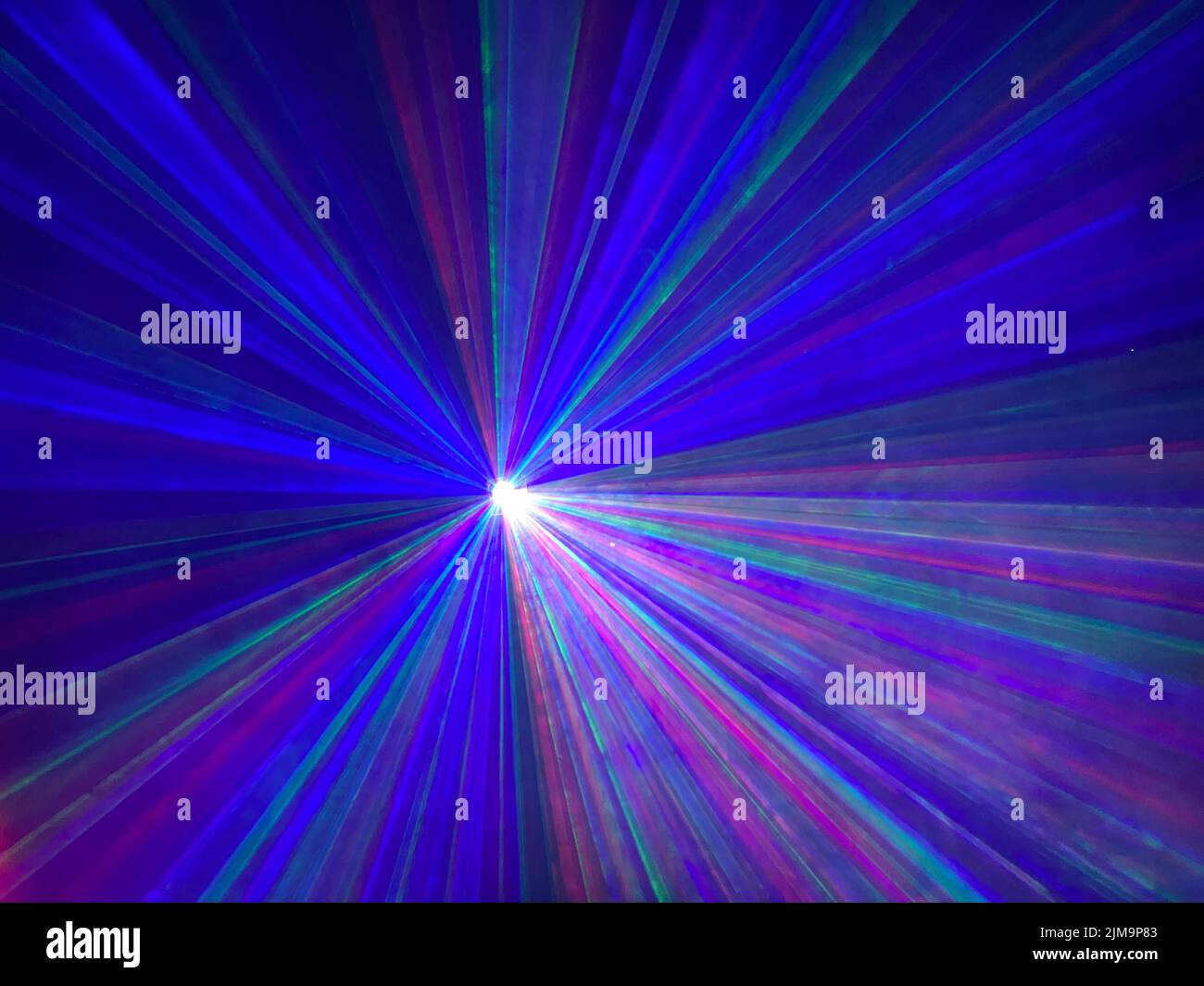 Colorful laser light beam photographic effect on black background ...