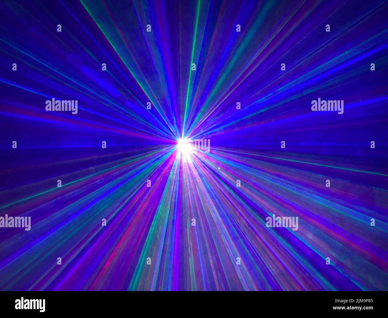 Colorful laser light beam photographic effect on black background ...