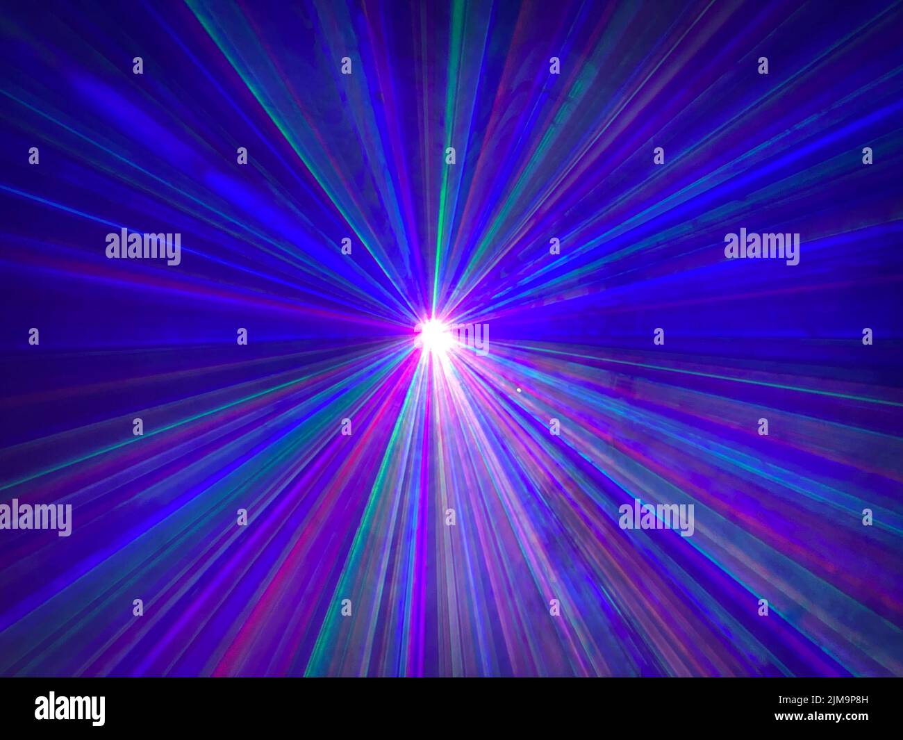 Colorful laser light beam photographic effect on black background ...