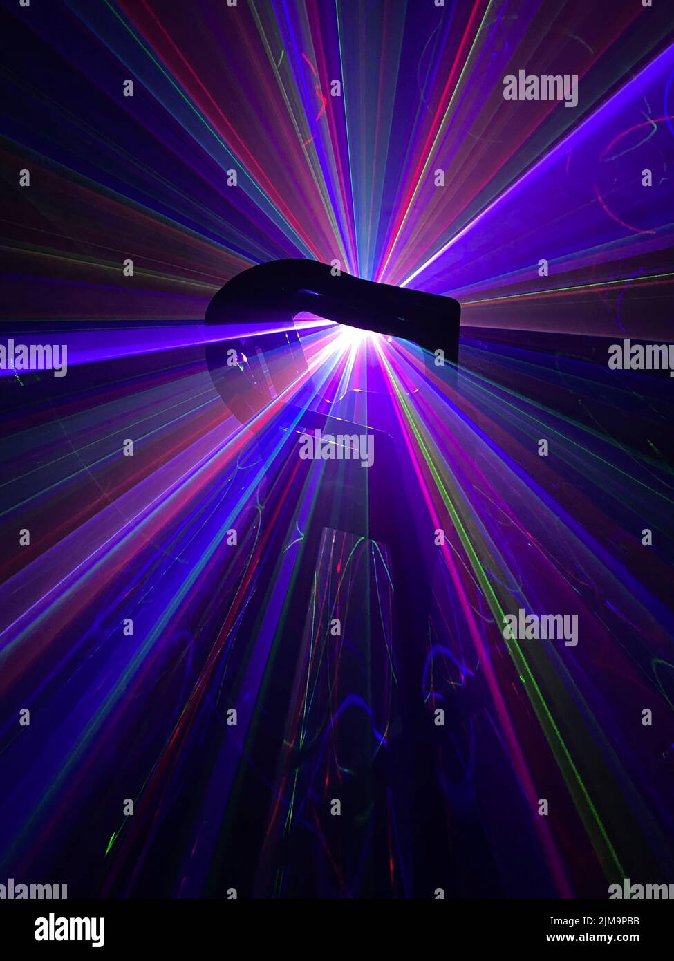 Colorful laser light beam photographic effect on black background ...
