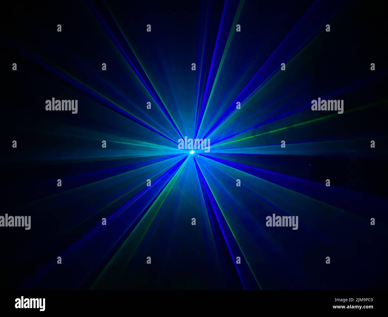 Colorful laser light beam photographic effect on black background ...