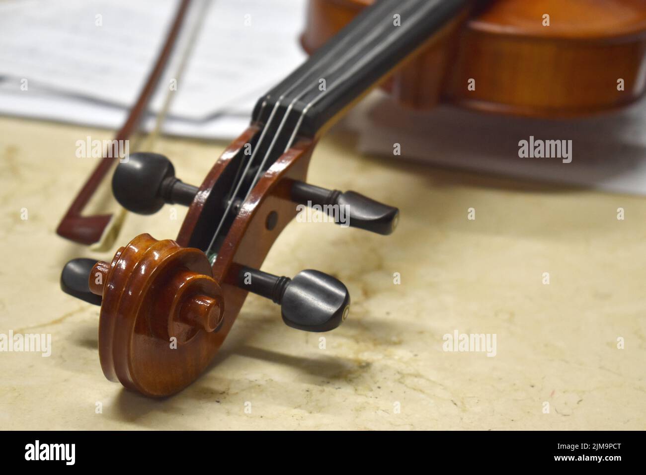 violin on sheet music and table Stock Photo - Alamy