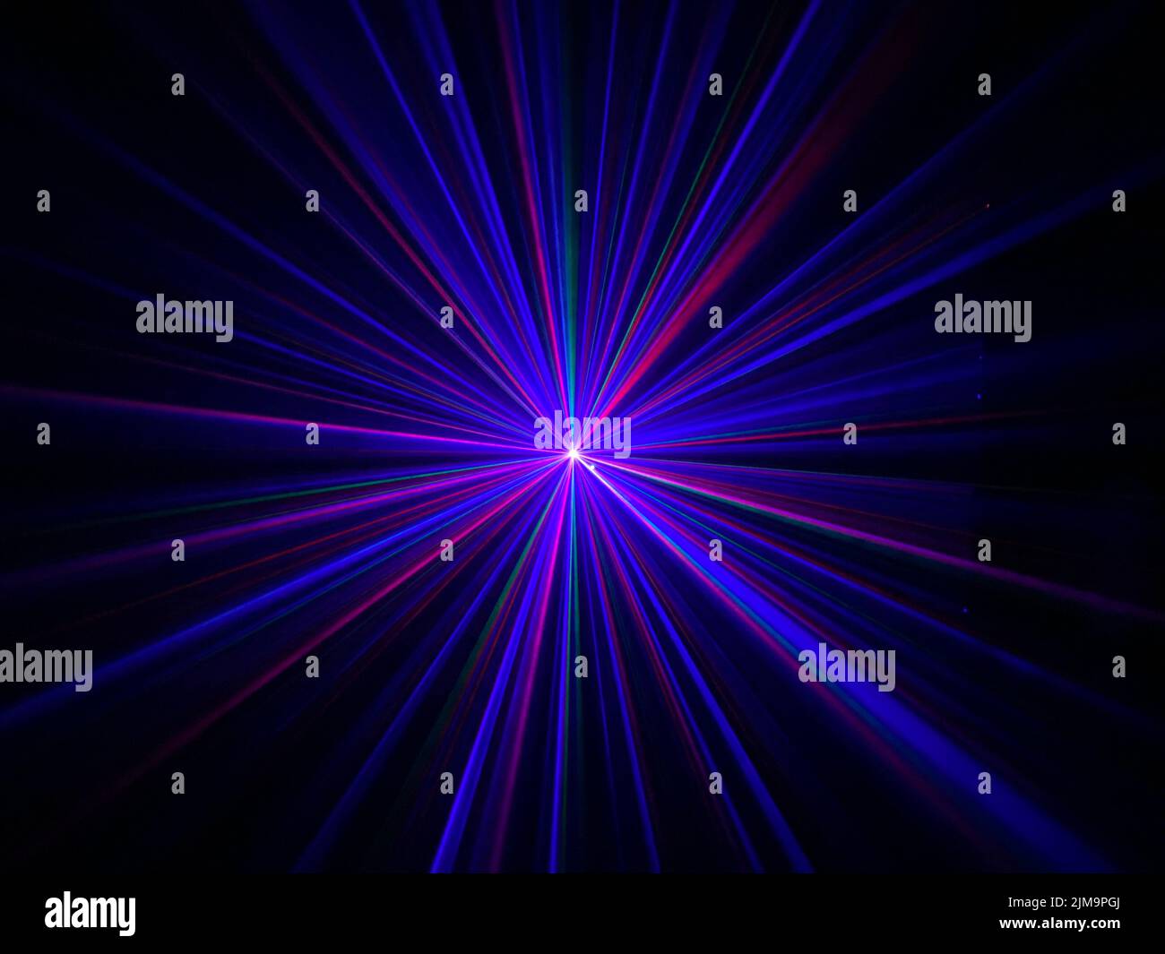 Colorful laser light beam photographic effect on black background ...