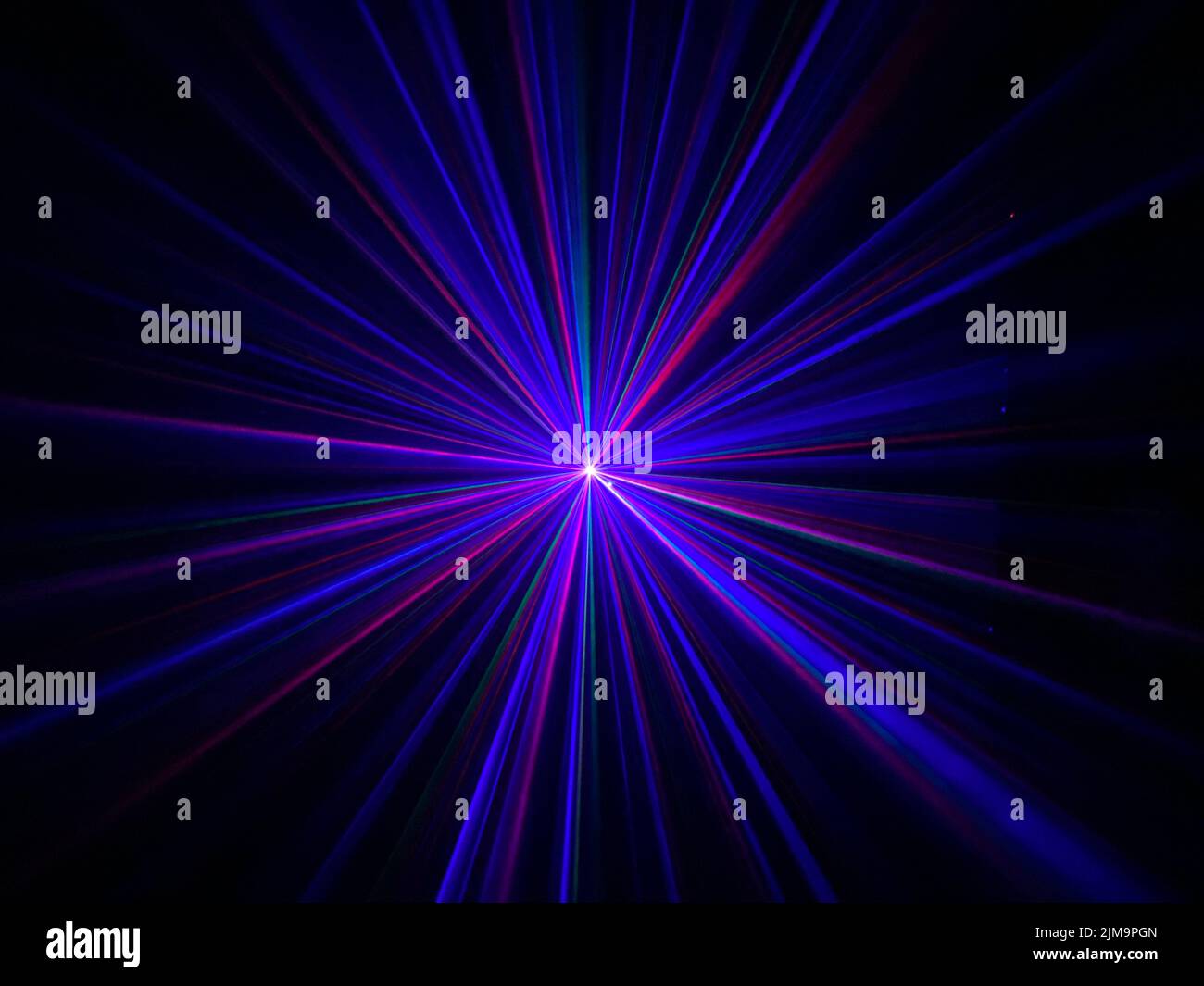 Colorful laser light beam photographic effect on black background ...