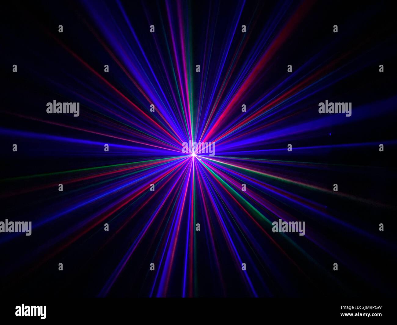 Colorful laser light beam photographic effect on black background ...