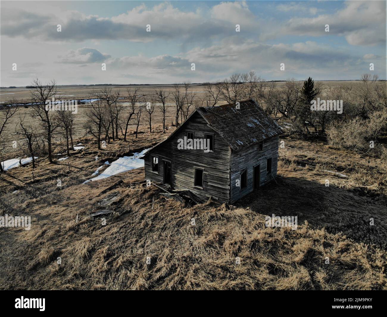 A rural house in a dry field Stock Photo - Alamy
