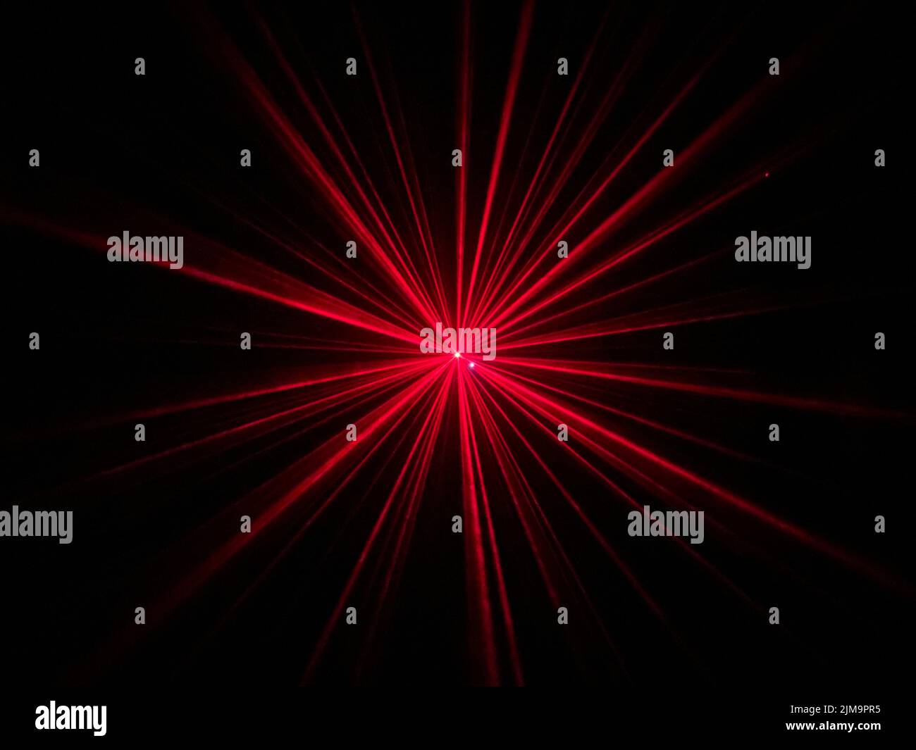 Colorful laser light beam photographic effect on black background ...