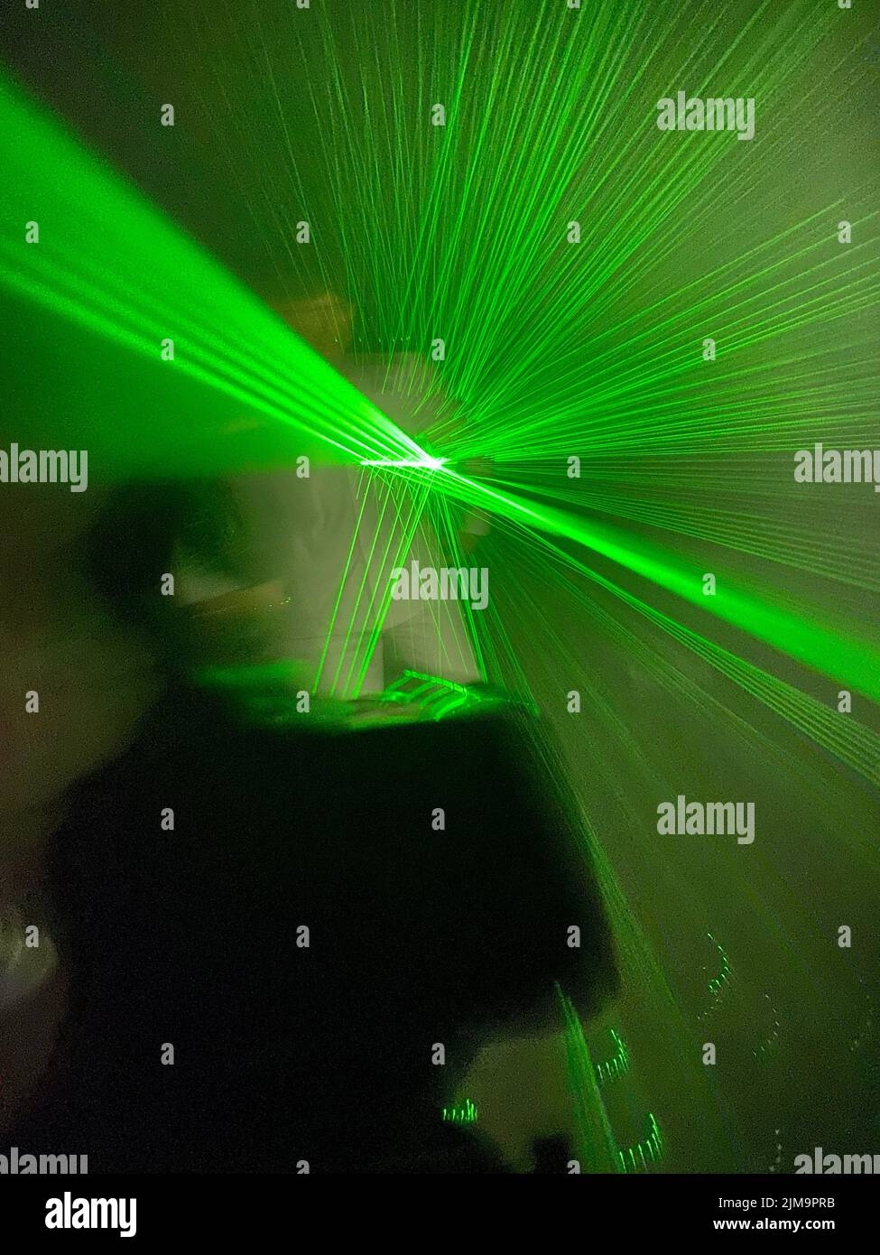 Colorful laser light beam photographic effect on black background ...