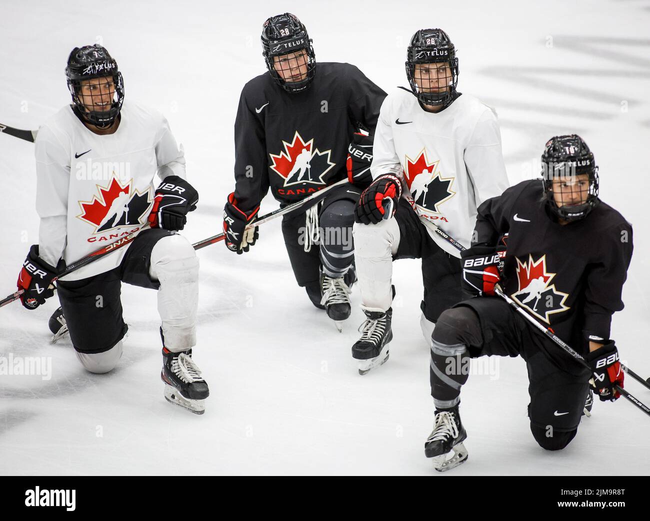 Players, left to right, Laura Stacey, Sarah Fillier, Emily Clark, and ...