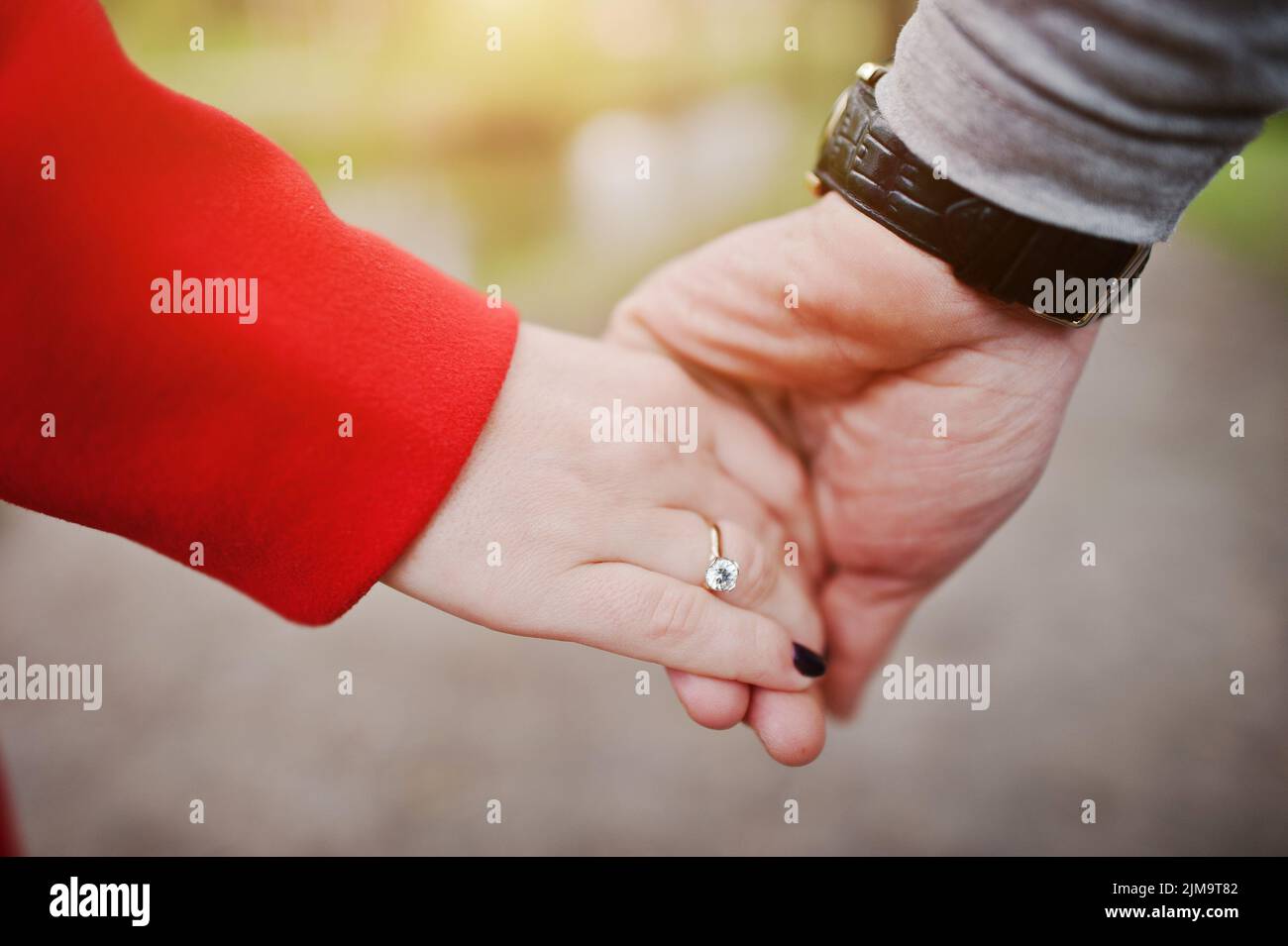 Couple touching hand hi-res stock photography and images - Alamy