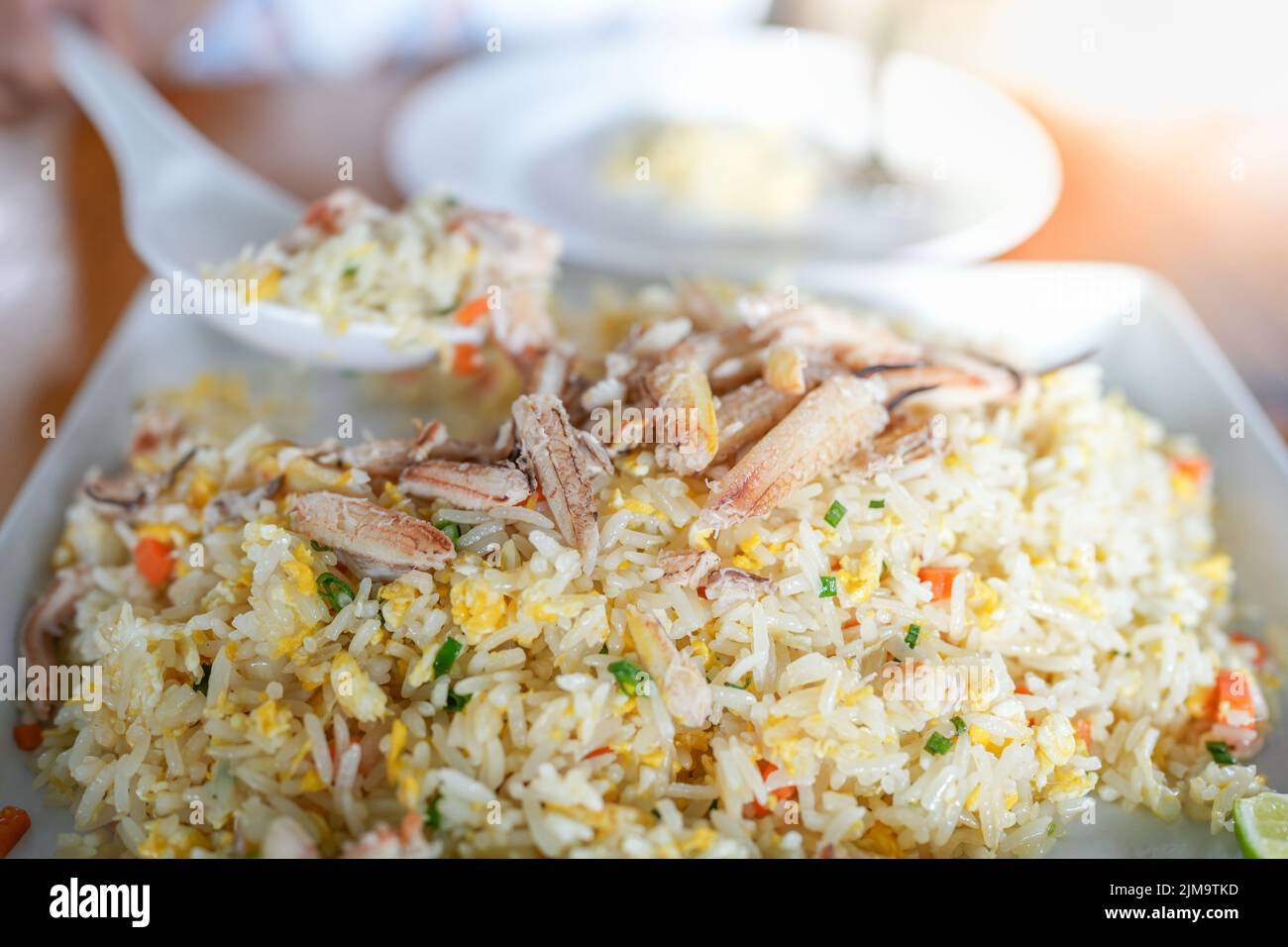 A serving of rice with meat and vegetables Stock Photo - Alamy