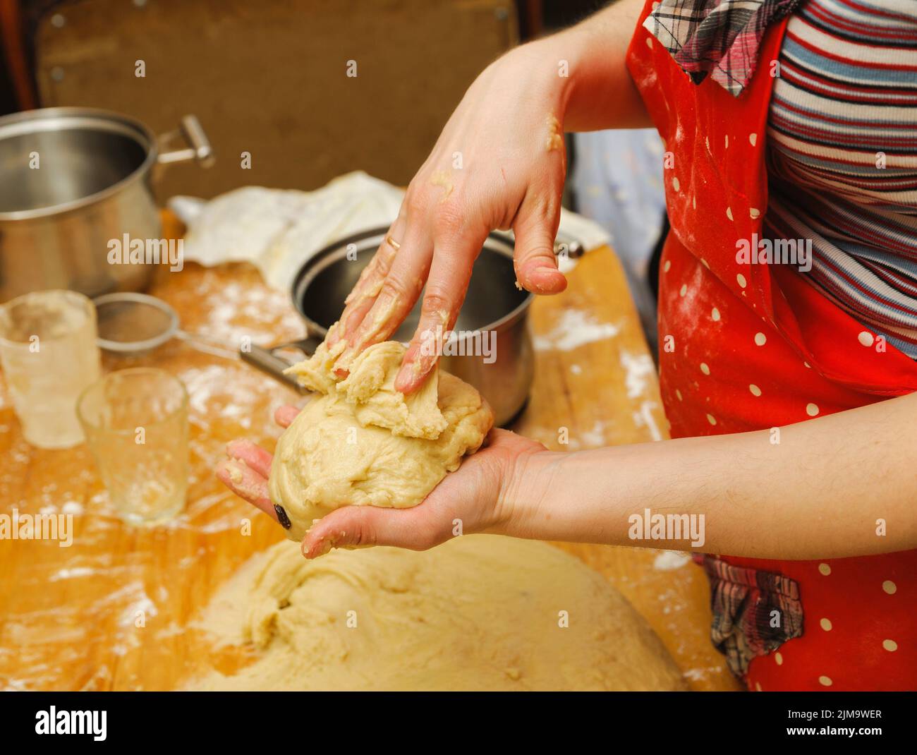 Prepare meal food. modelling dough in hands Stock Photo - Alamy