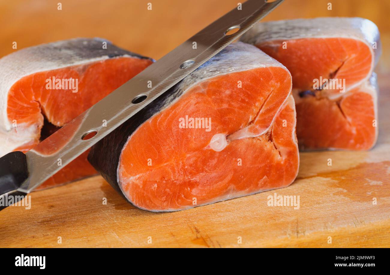 Frozen red pieces of red fish. delicacy food Stock Photo - Alamy