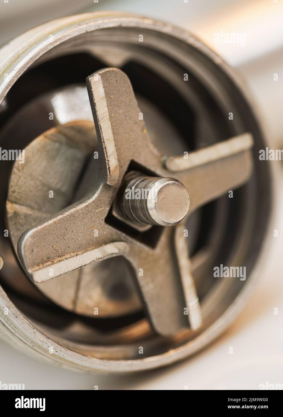 Close-up of meat grinder part Stock Photo - Alamy