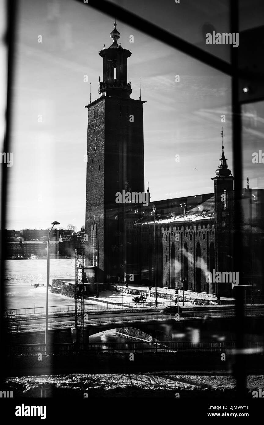 The Stockholm City Hall in Sweden framed through the windows of a ...