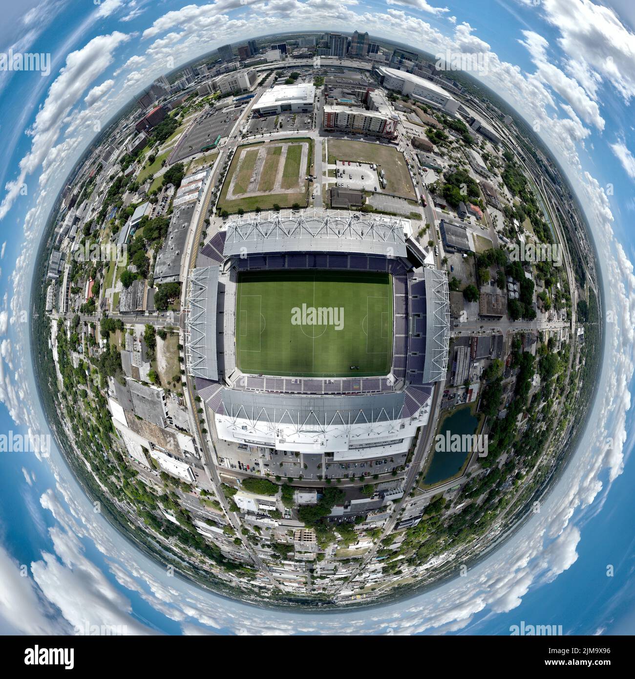 Aerial "Tiny Planet" view of downtown Orlando with Orlando City Soccer ...