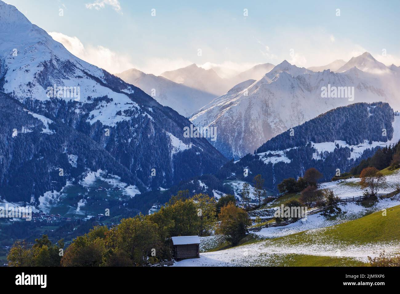 Scenic view at snow capped mountains in a alp valley Stock Photo - Alamy