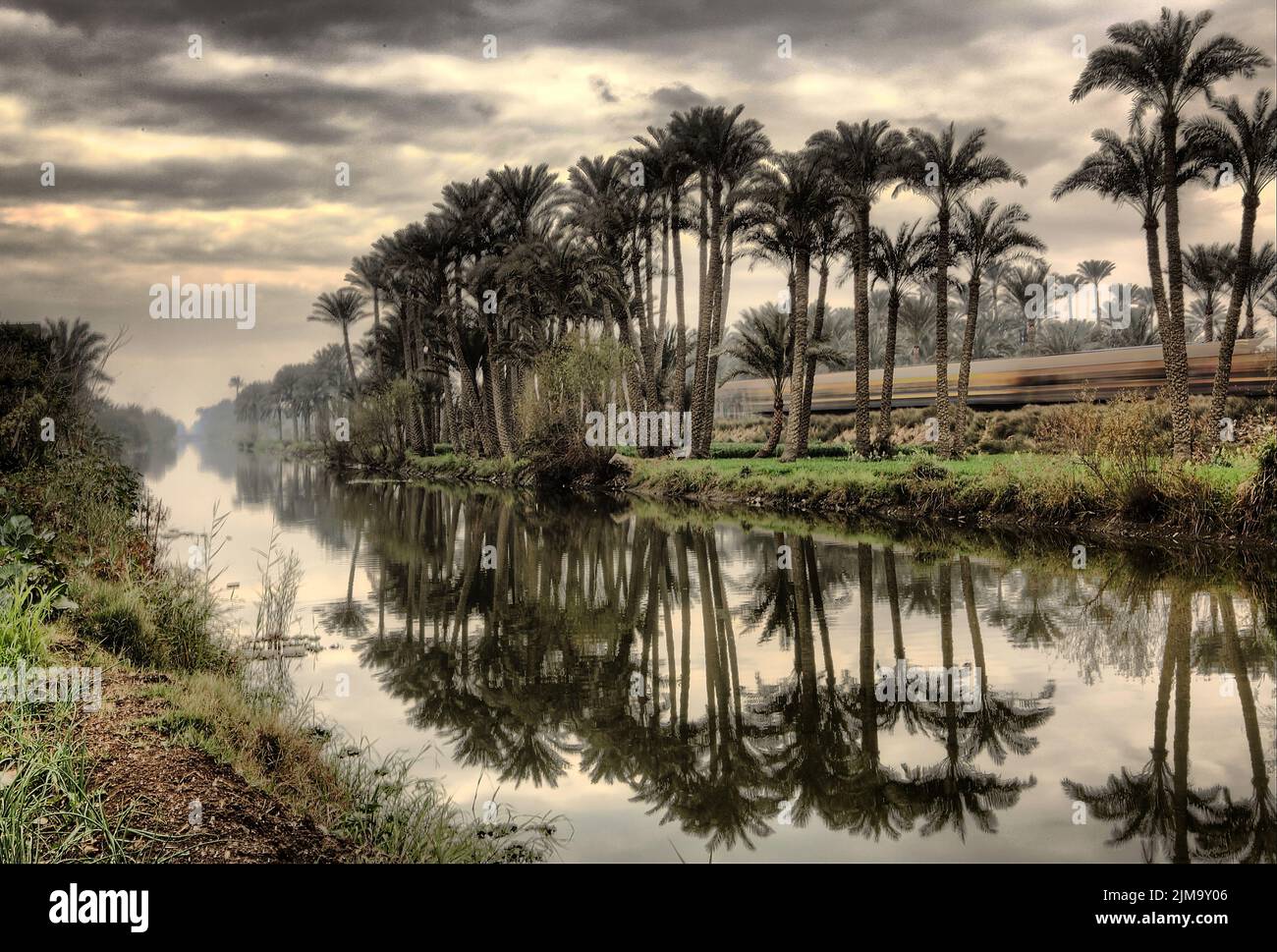 A fast-moving train in a countryside area in Egypt Stock Photo - Alamy