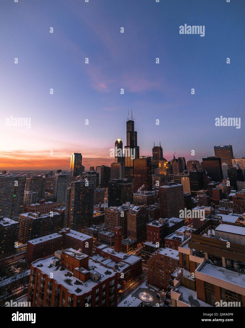 A vertical shot of Chicago cityscape with Sears Tower and Willis Tower ...