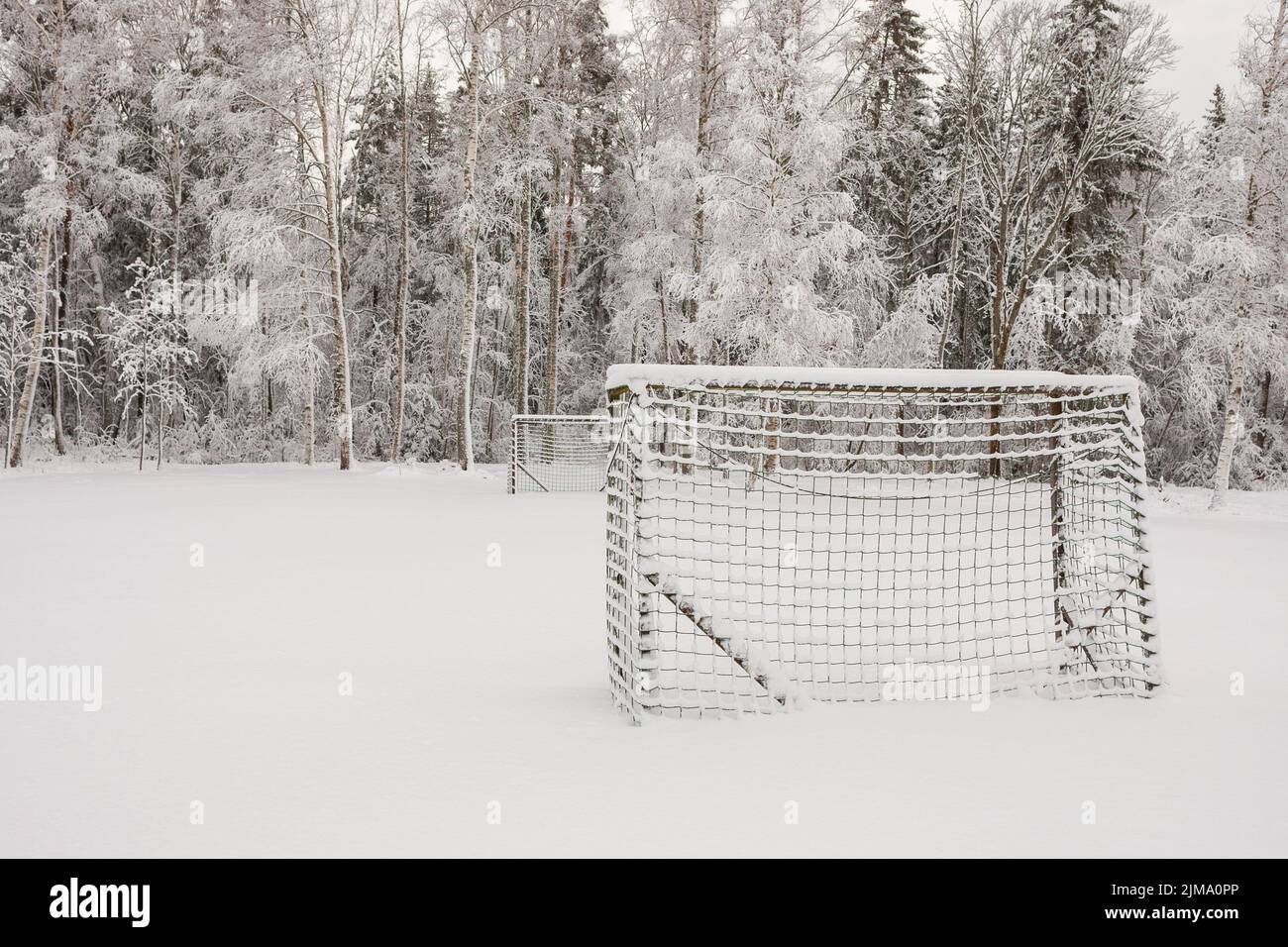 A football field covered with snow Stock Photo - Alamy