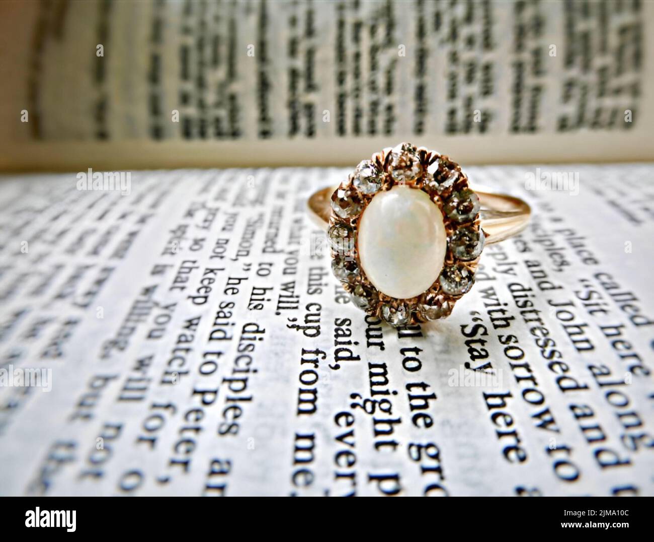 Ring on book hi-res stock photography and images - Alamy