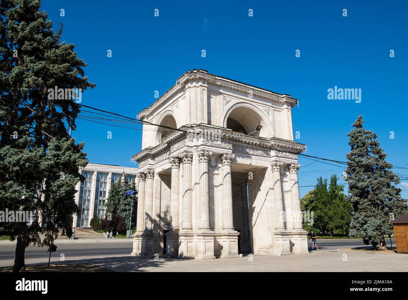 Moldova, Chisinau, Triumphal Arch in front of the government building ...