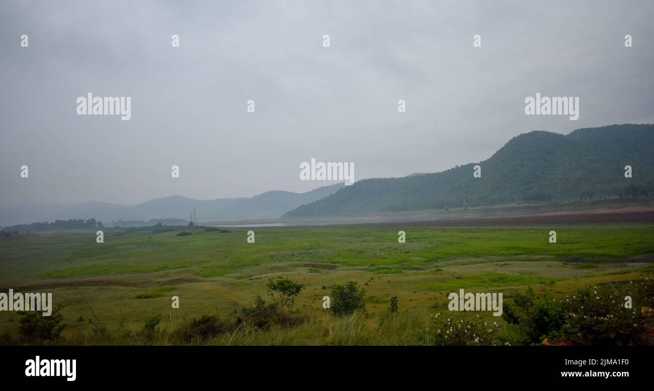Capturing Beautiful countryside landscape with forested mountains and ...