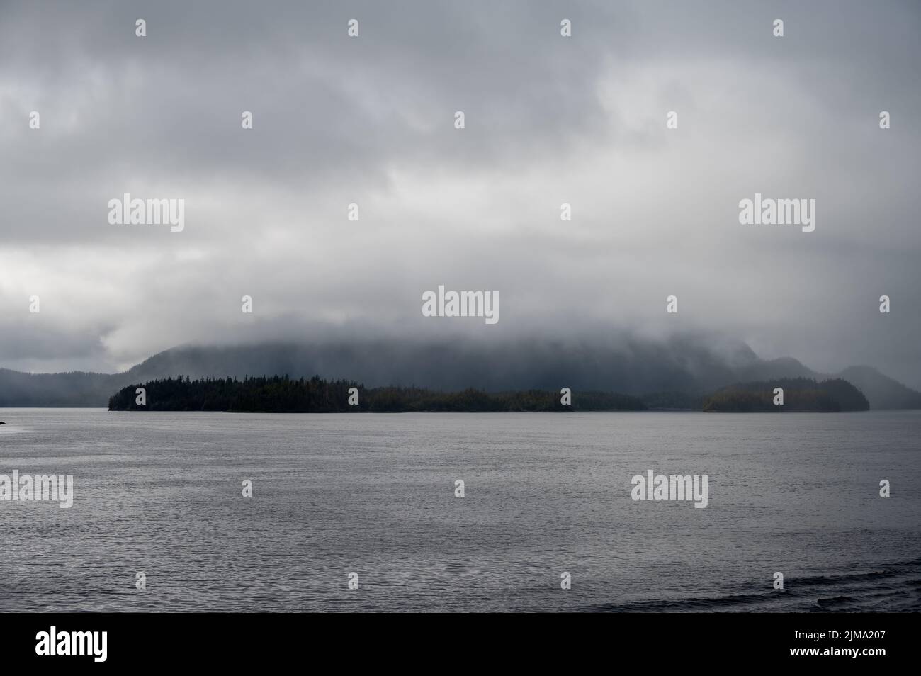 Beautiful views of clouds and mountains along the Alaska coast near ...