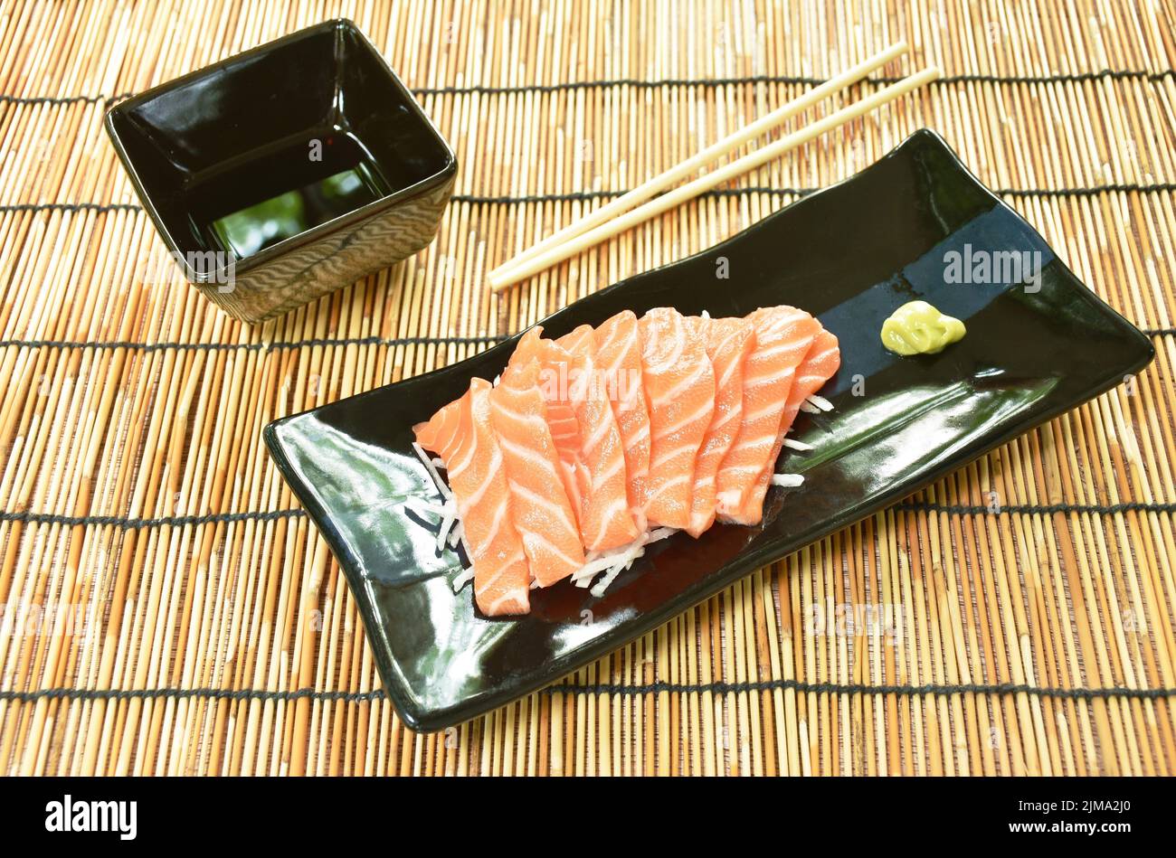 fresh slice salmon sashimi Japanese food dressing wasabi and shoyu soy ...