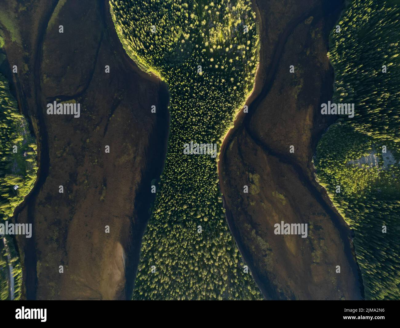 A top view shot of an island with green trees in Norway Stock Photo - Alamy