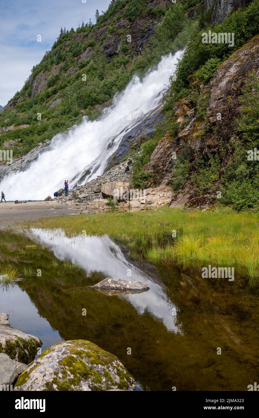 Views of the Nugget Falls the pours into the glacial lake at Mendenhall ...