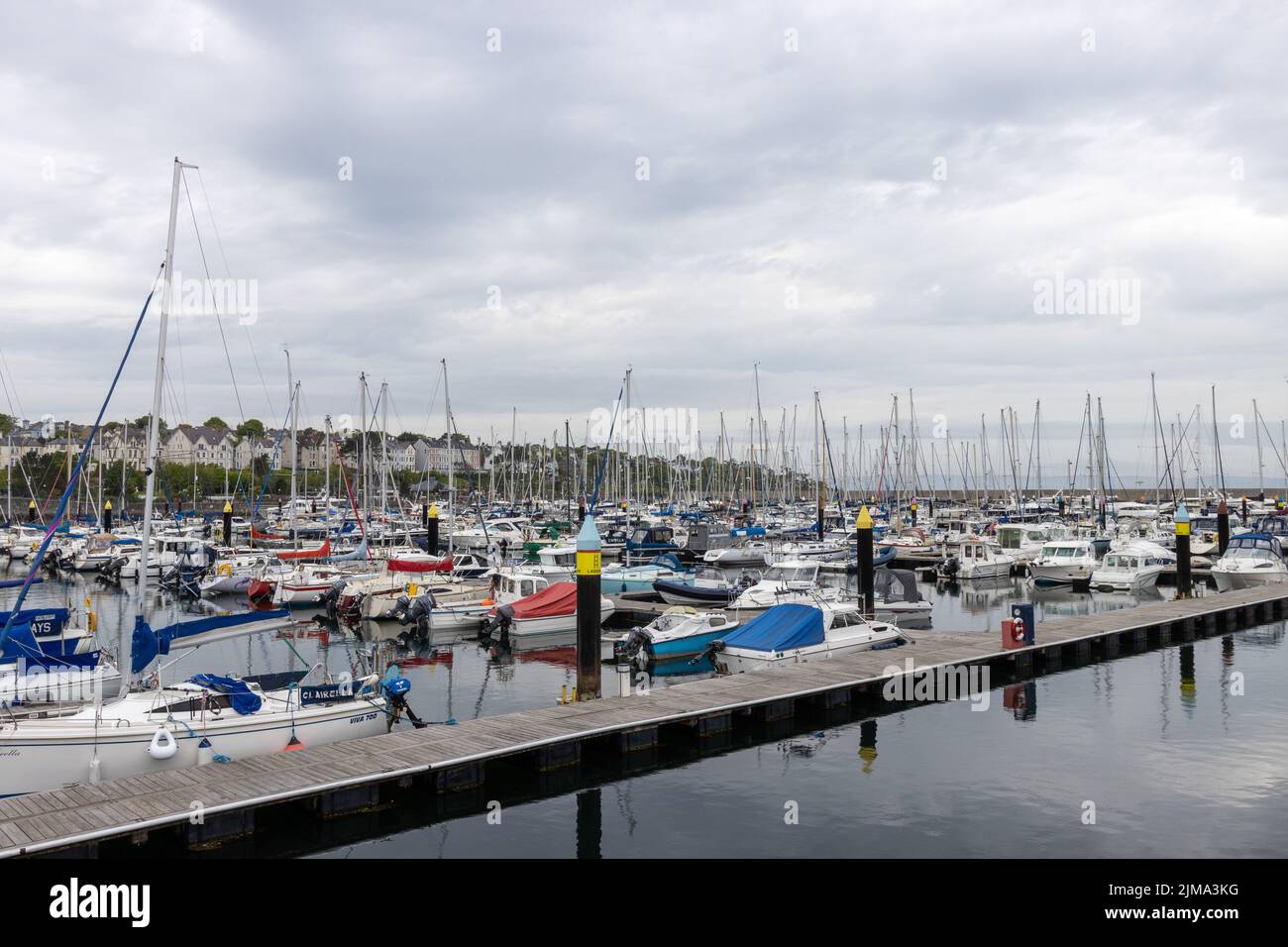 A scenic view of boats moored at a harbor on a cloudy day in Bangor ...