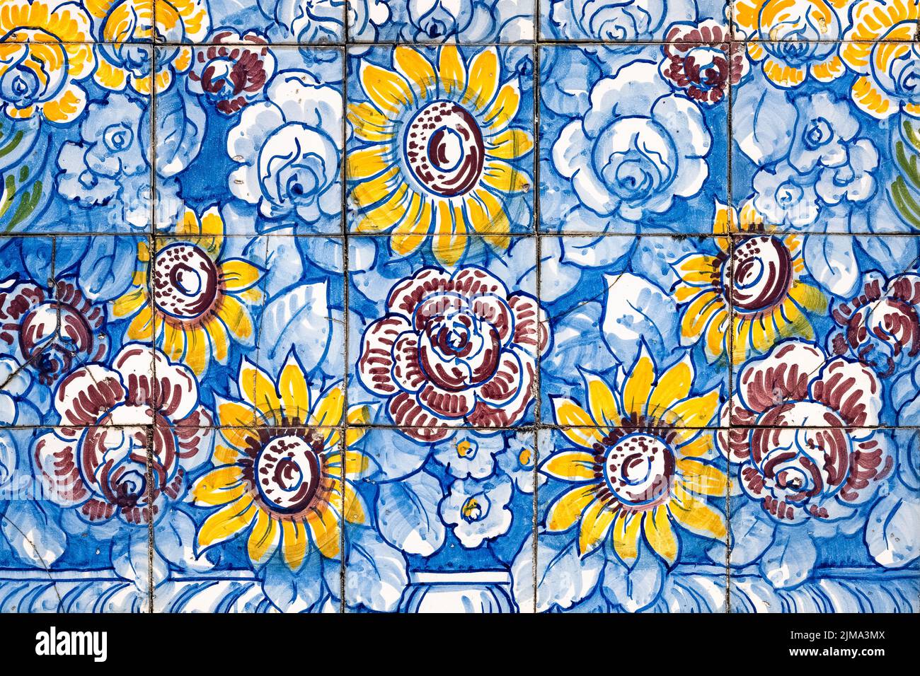 Azulejos in Portugal, detail of a bunch of flowers on a typical house ...