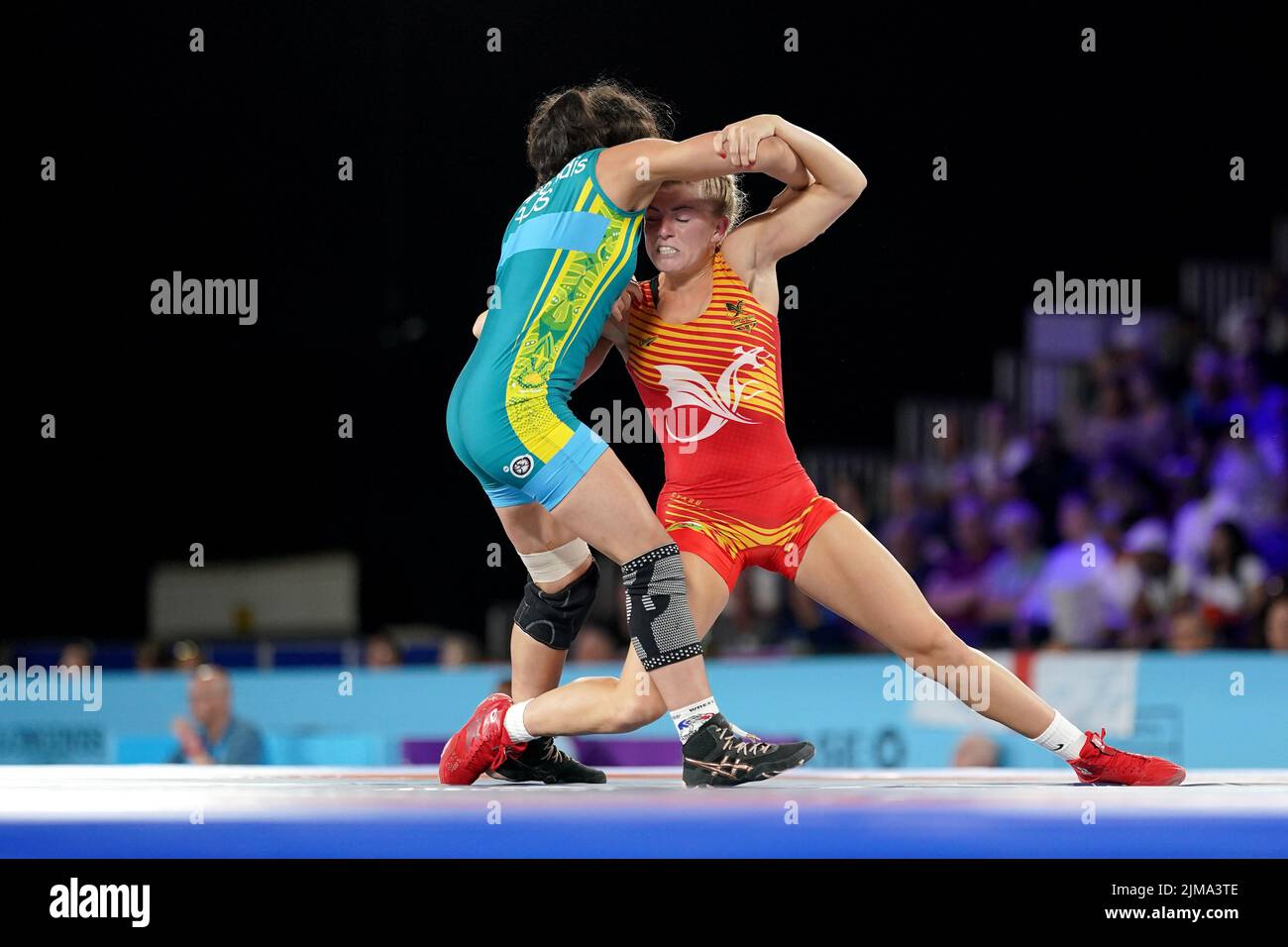 Wales' Shannon Harry graples with Australia's Irene Symeonidis during ...