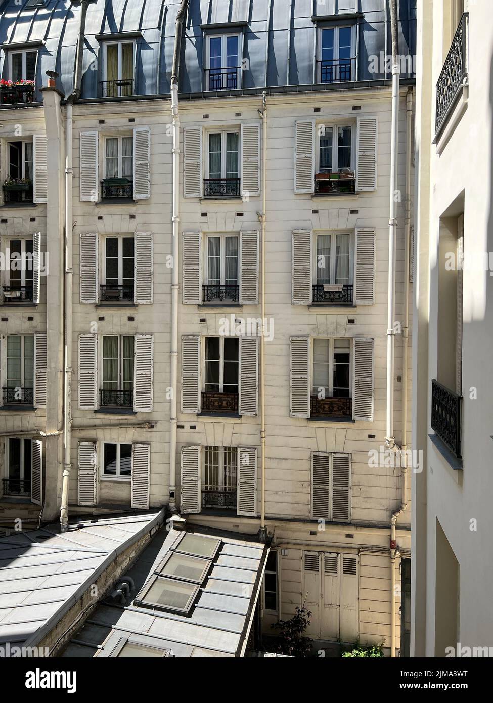 A vertical shot of a beautiful building in the center of Paris, typical ...