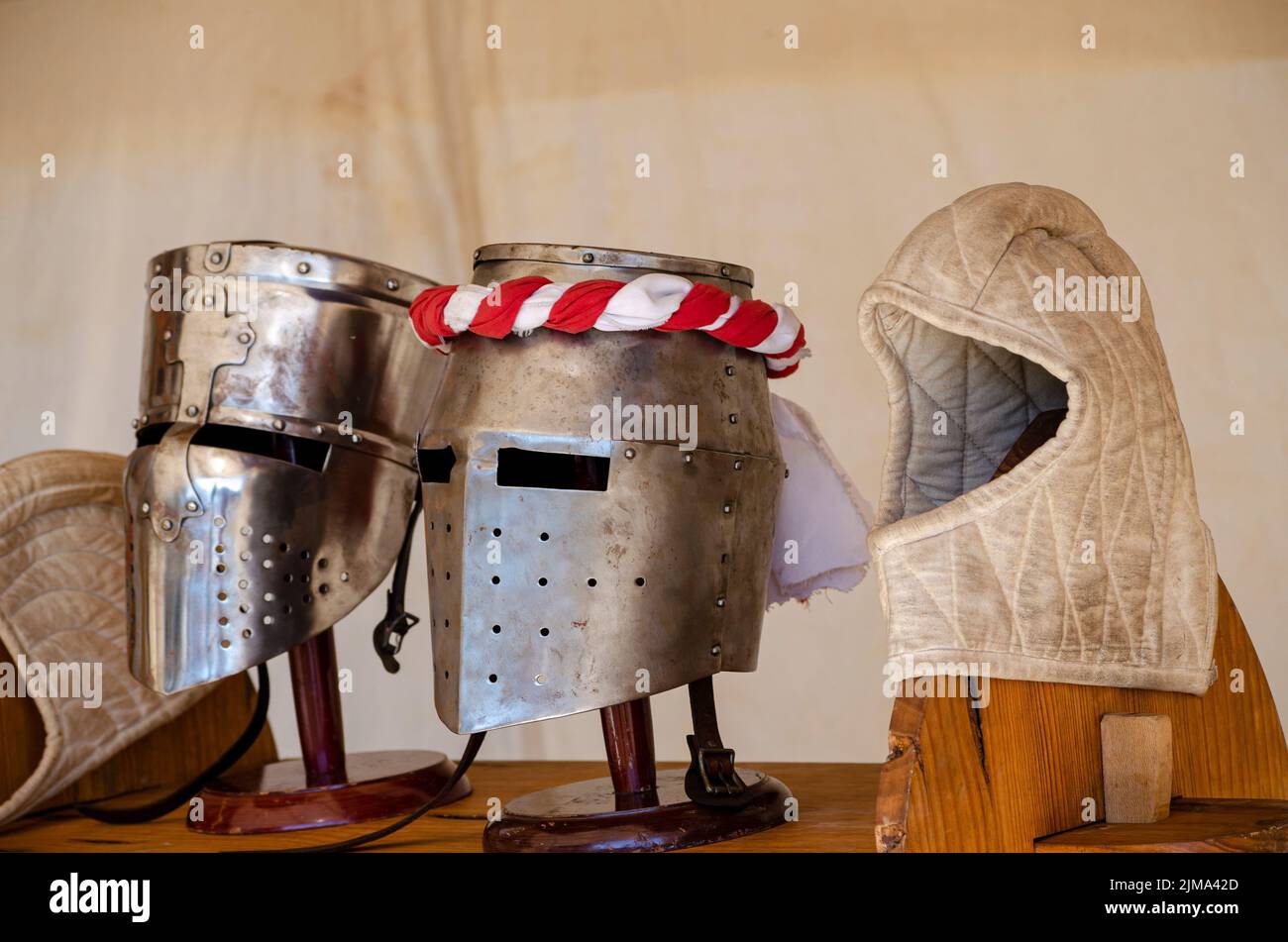 medieval knight helmets as props at a historical reenactment festival ...